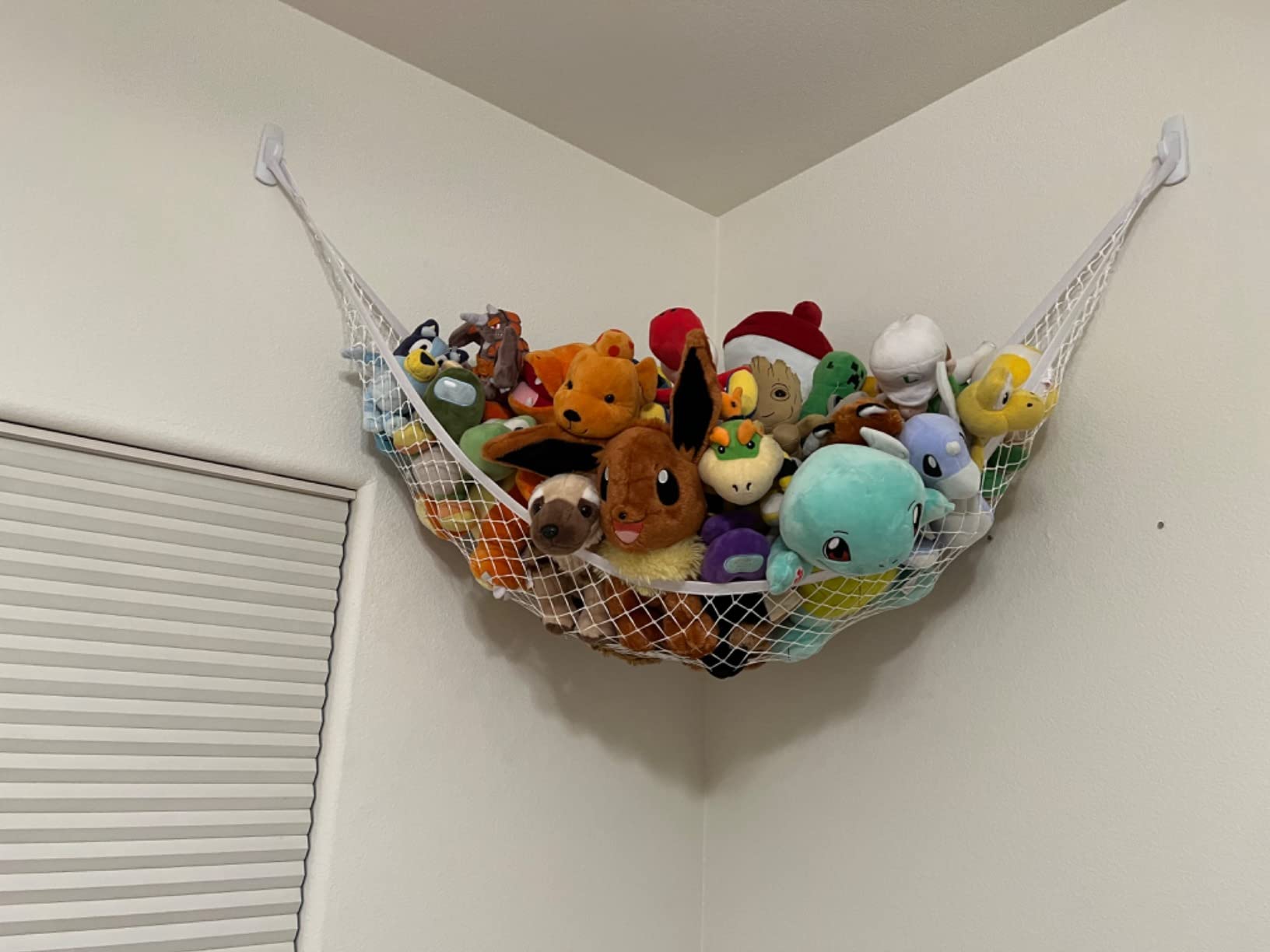 23 Genius Stuffed Animal Storage Ideas for Small Spaces - Addicted To ...